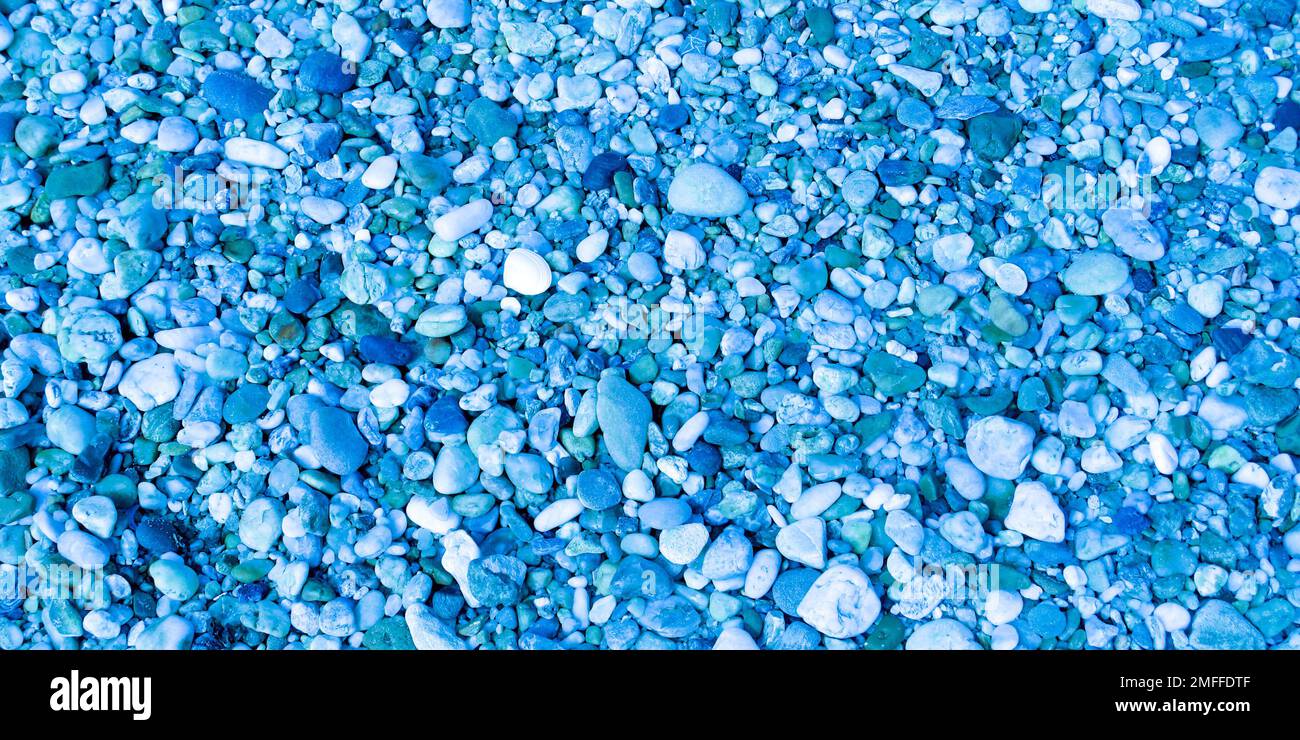 blue little pebbles stone for background Beach water cooled Stock Photo ...