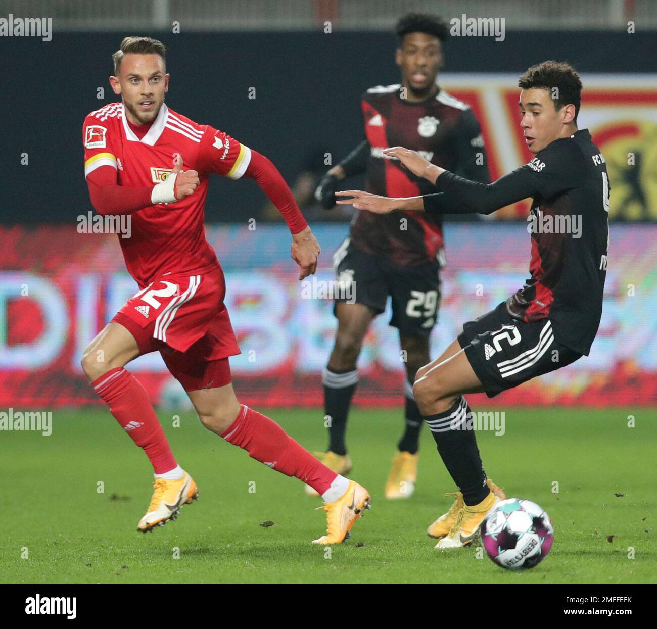 Bayern's Jamal Musiala, right, challenges Union's Marcus Ingvartsen ...