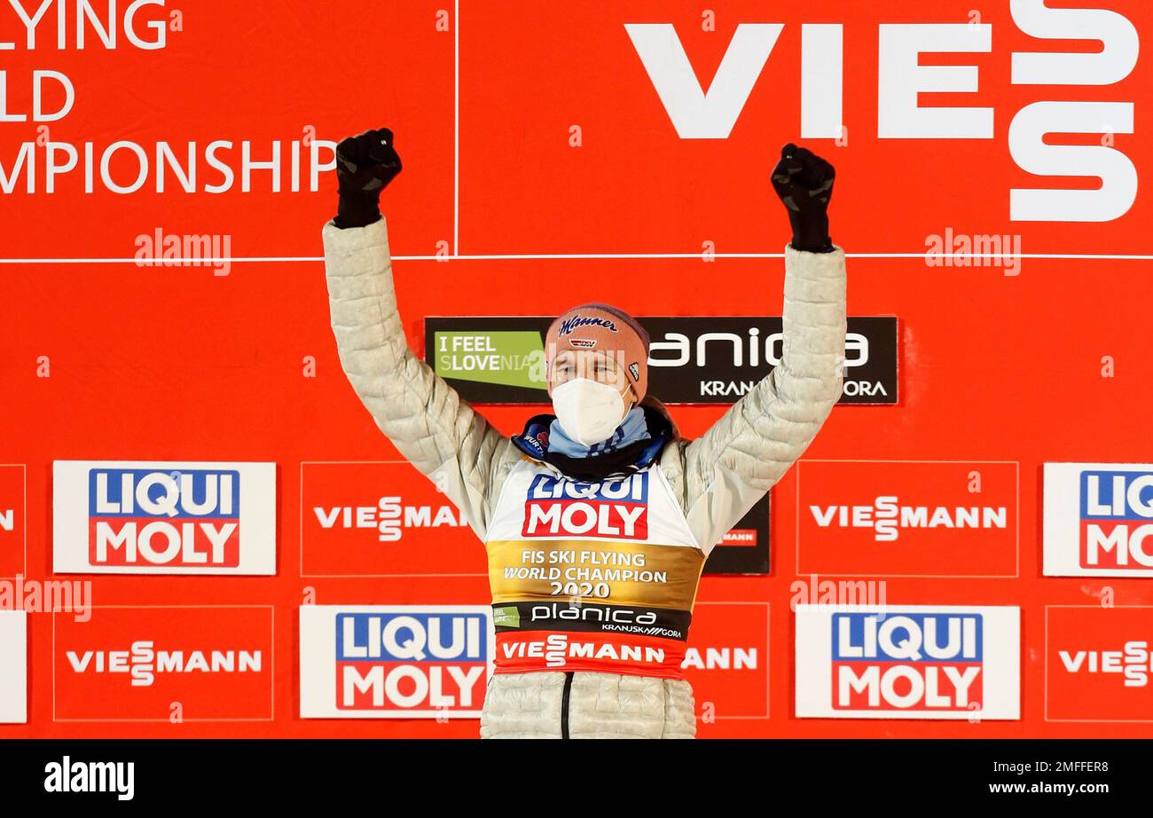Winner Germany's Karl Geiger celebrates during the award ceremony after ...