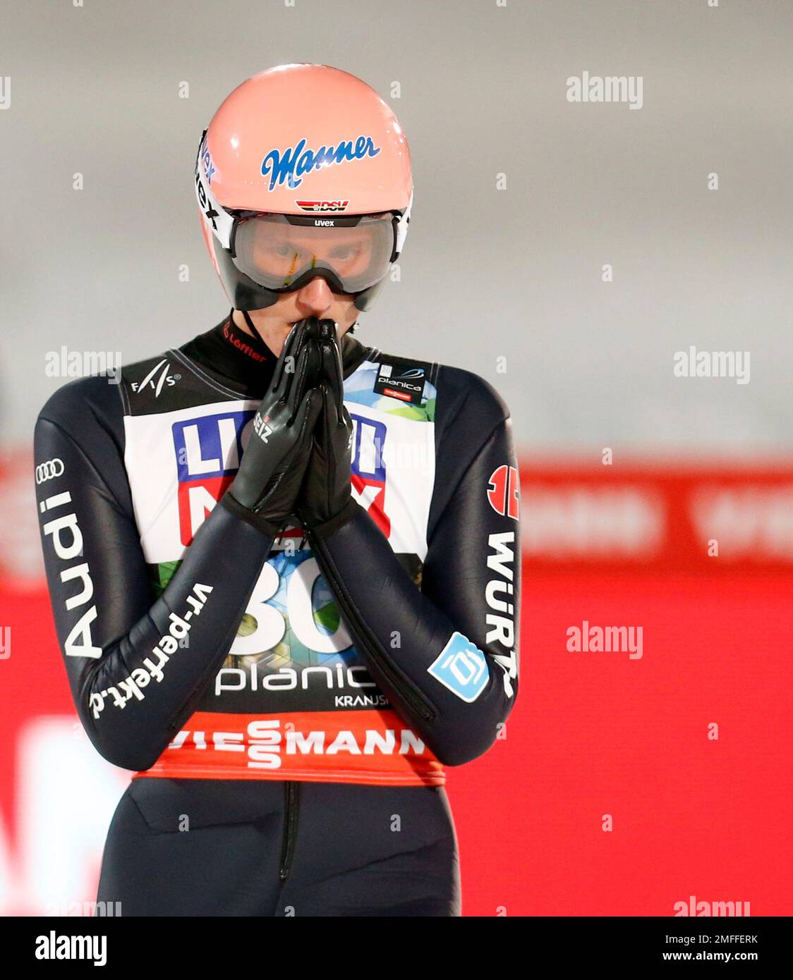 Winner Germany's Karl Geiger reacts after his final jump at the Ski ...