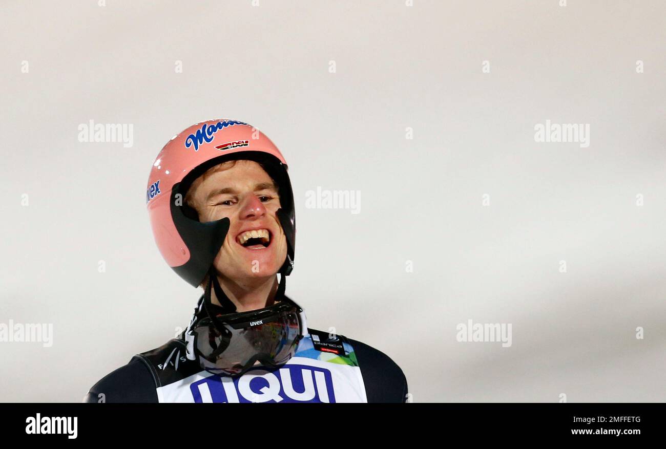 Winner Germany's Karl Geiger celebrates after his final jump at the Ski ...