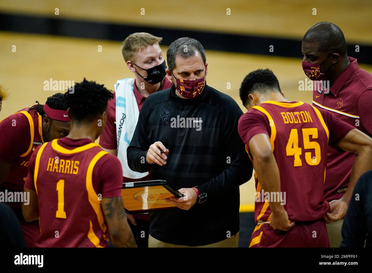 Iowa State head coach Steve Prohm talks to his players during a timeout ...