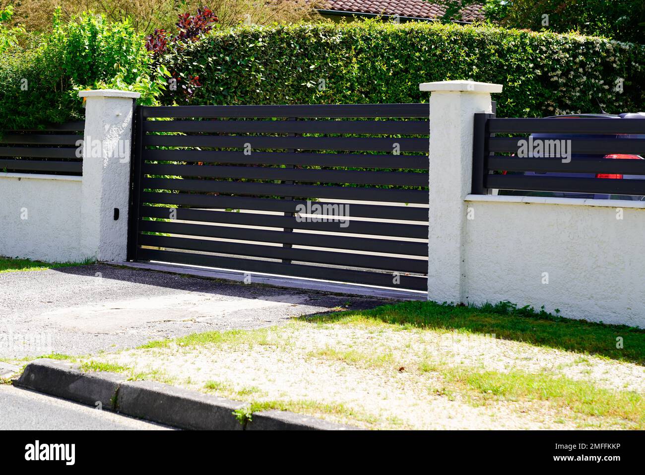 Aluminum dark gray modern grey portal of suburb Stock Photo - Alamy