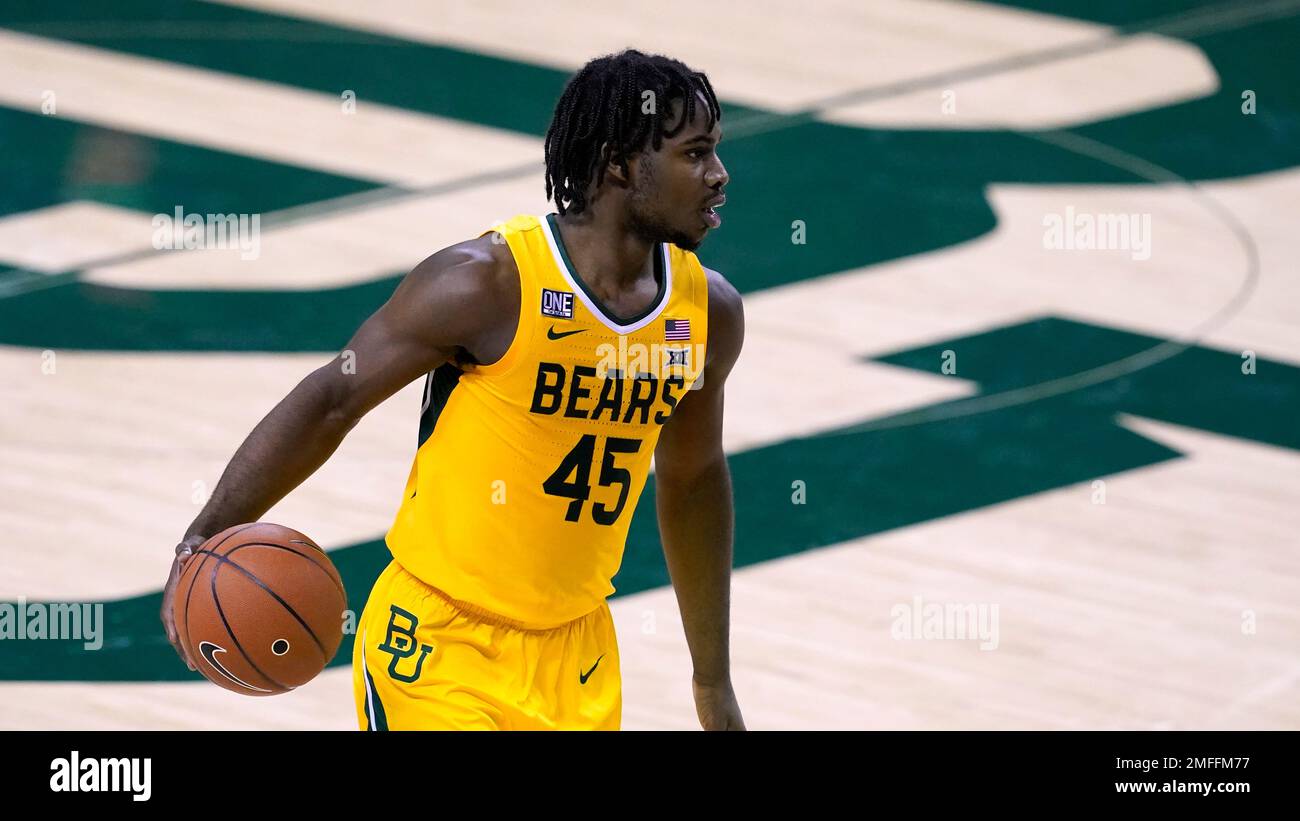 Baylor guard Davion Mitchell handles the ball during an NCAA college ...