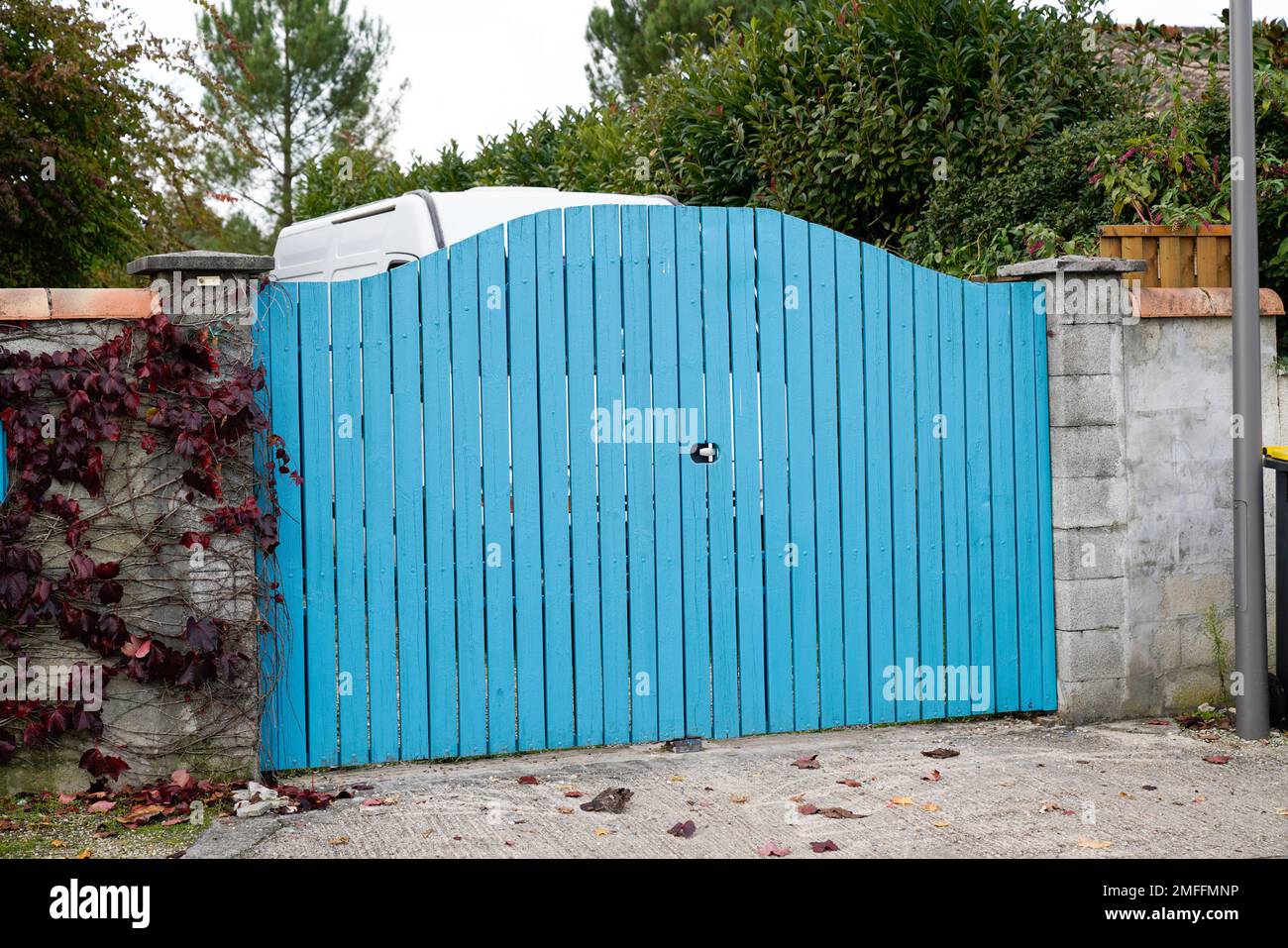 wooden blue gate portal of suburb ancient house Stock Photo - Alamy