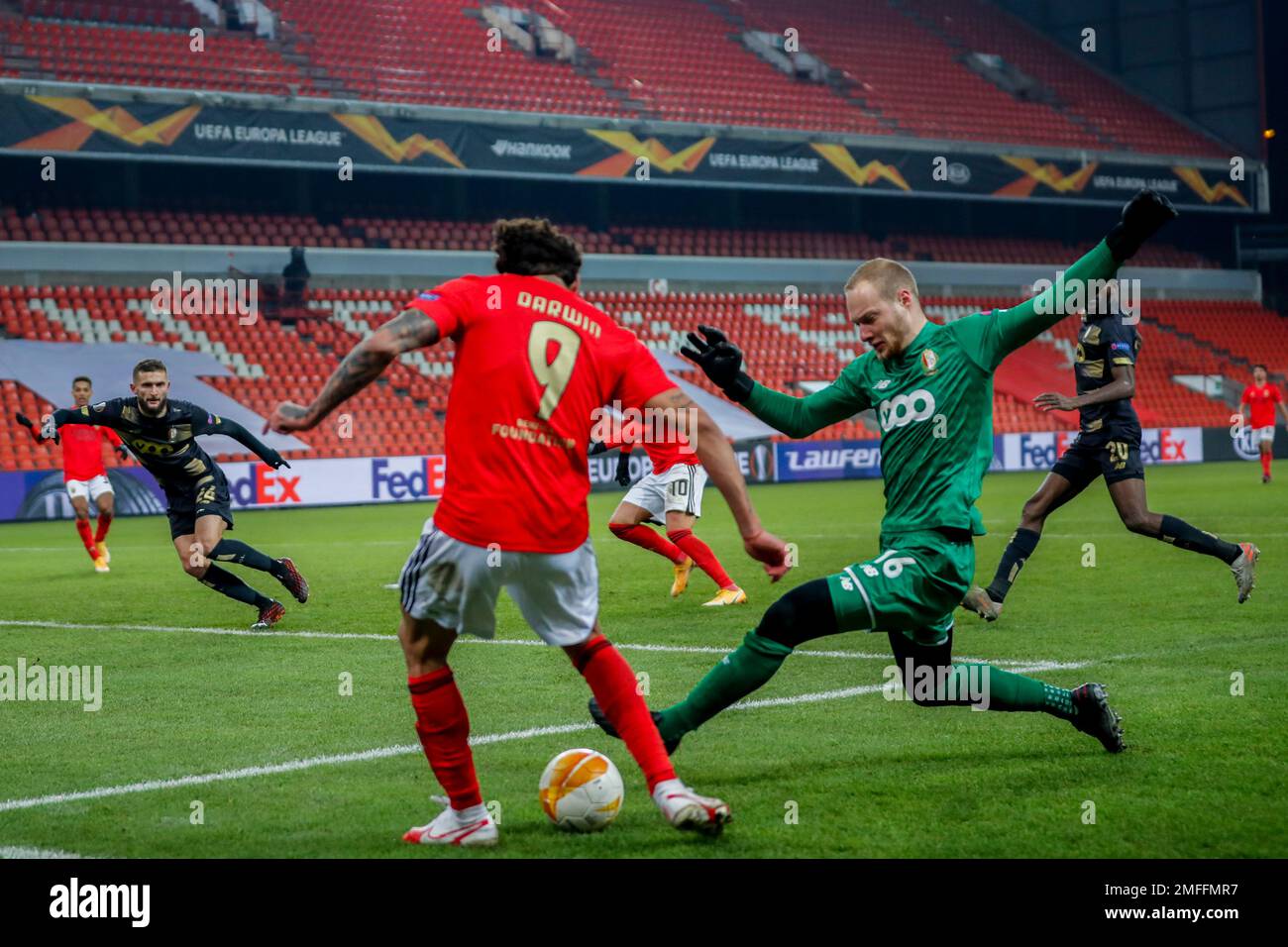 Benfica's Darwin Nunez, left, tries to score, next to Liege's ...