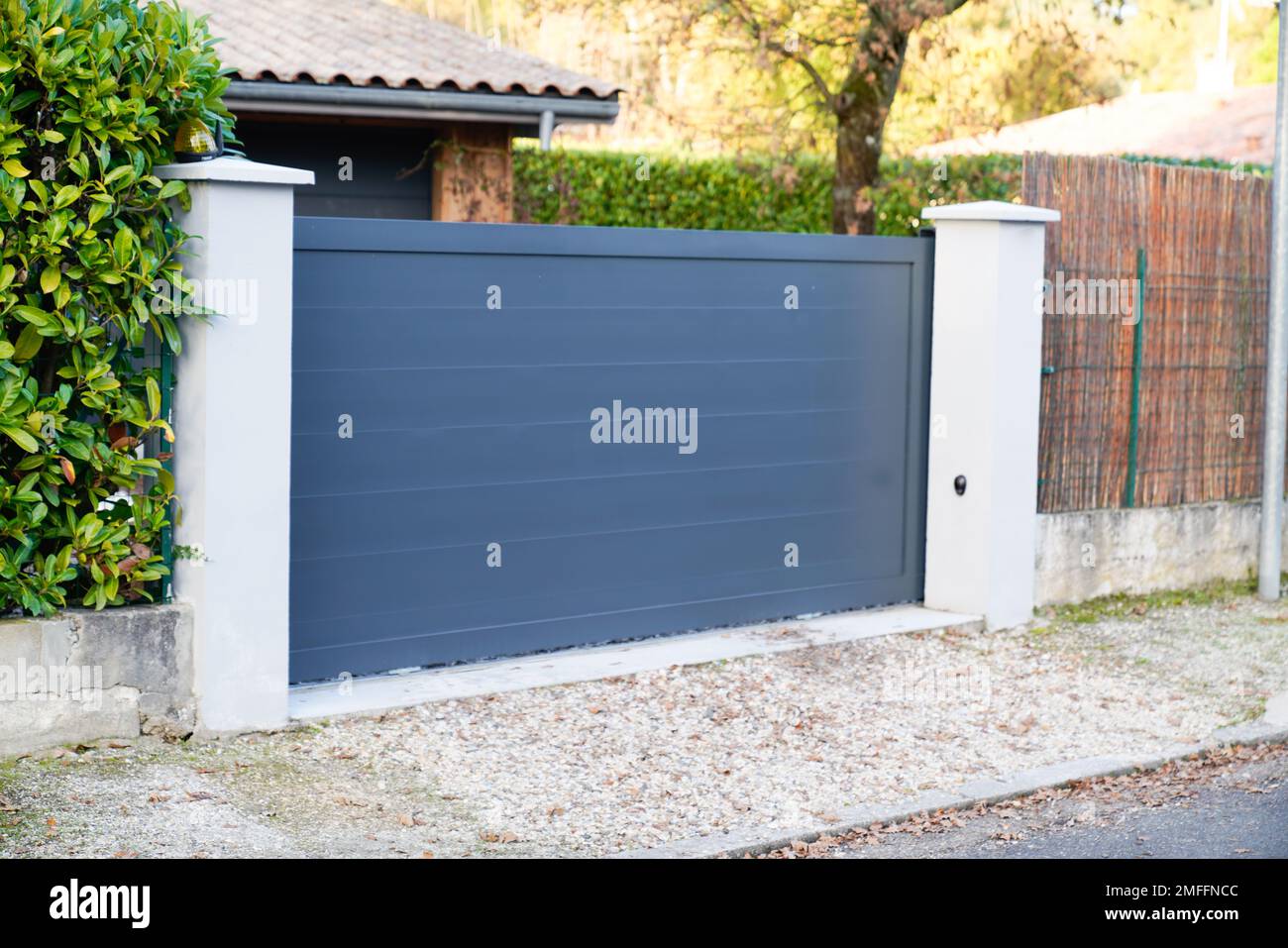 steel large gray metal gate fence on modern house street Stock Photo ...
