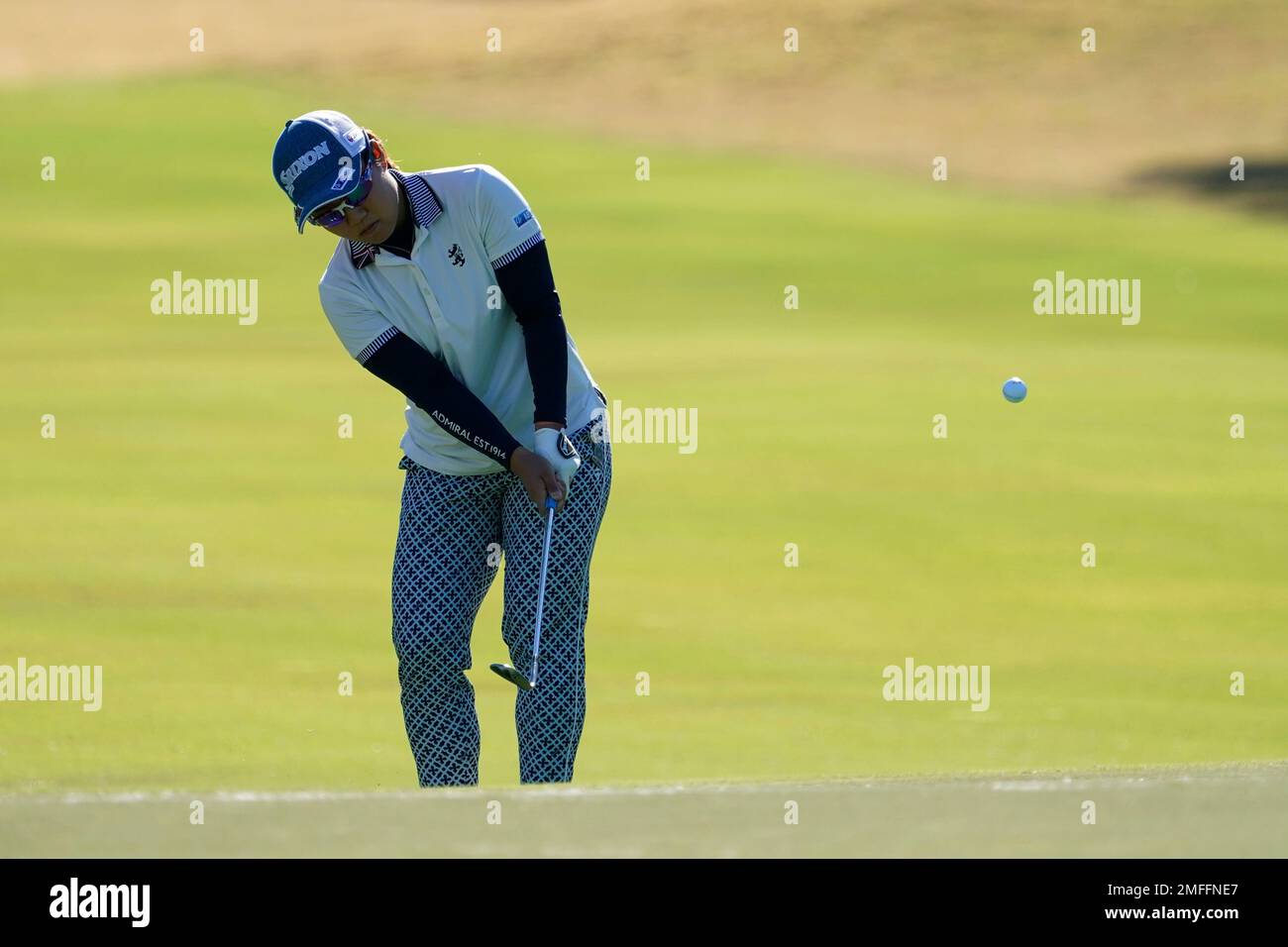 Nasa Hataoka, of Japan, chips onto the 11th green, during the first ...