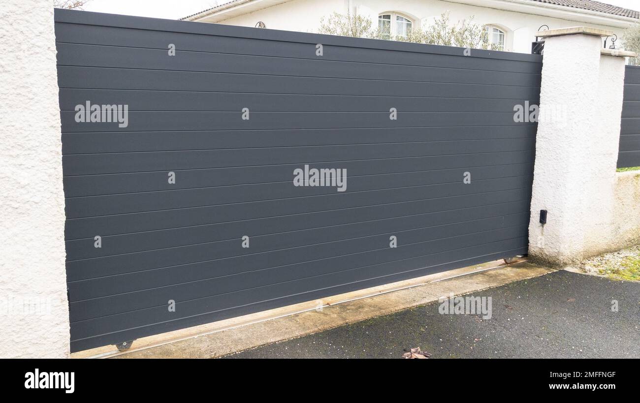 modern slide door grey gate aluminum portal to home access Stock Photo ...