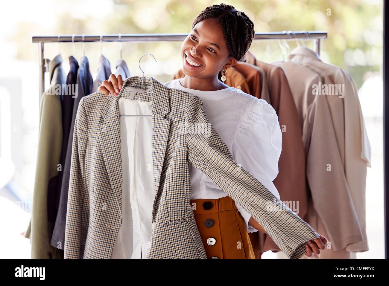 Shopping, fashion and black woman with choice, wardrobe inspiration or ...