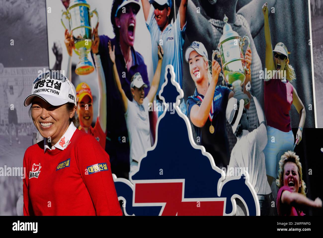 Mi Jung Hur, of South Korea, smiles as she walks toward the 10th tee ...