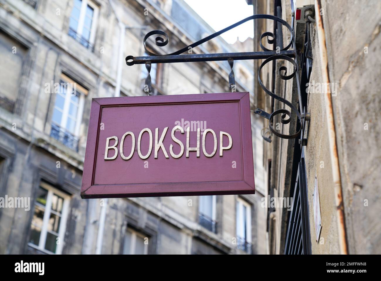 bookshop text vintage signage wooden panel retro bookstore sign in city ...