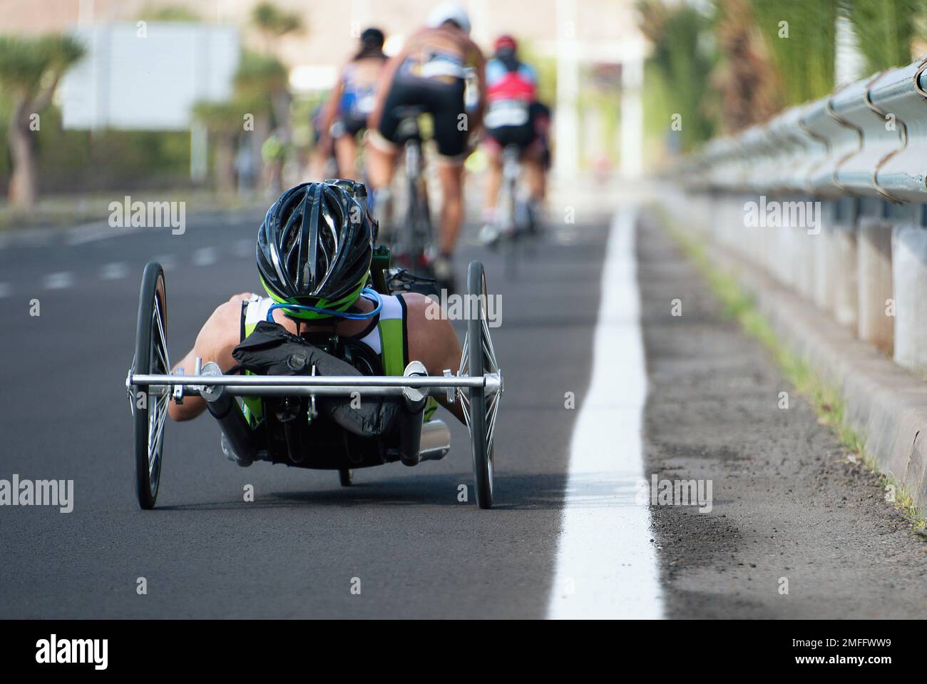 Wheelchair race cycling race triathlon participant, para triathlete ...