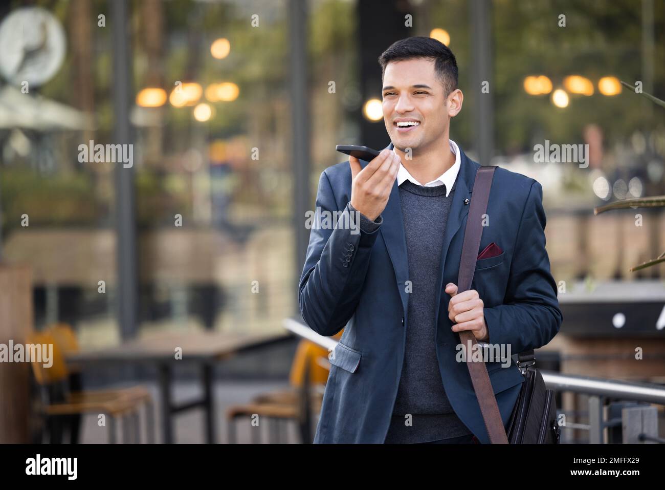 Happy, loud speaker or communication man with phone call for contact us ...