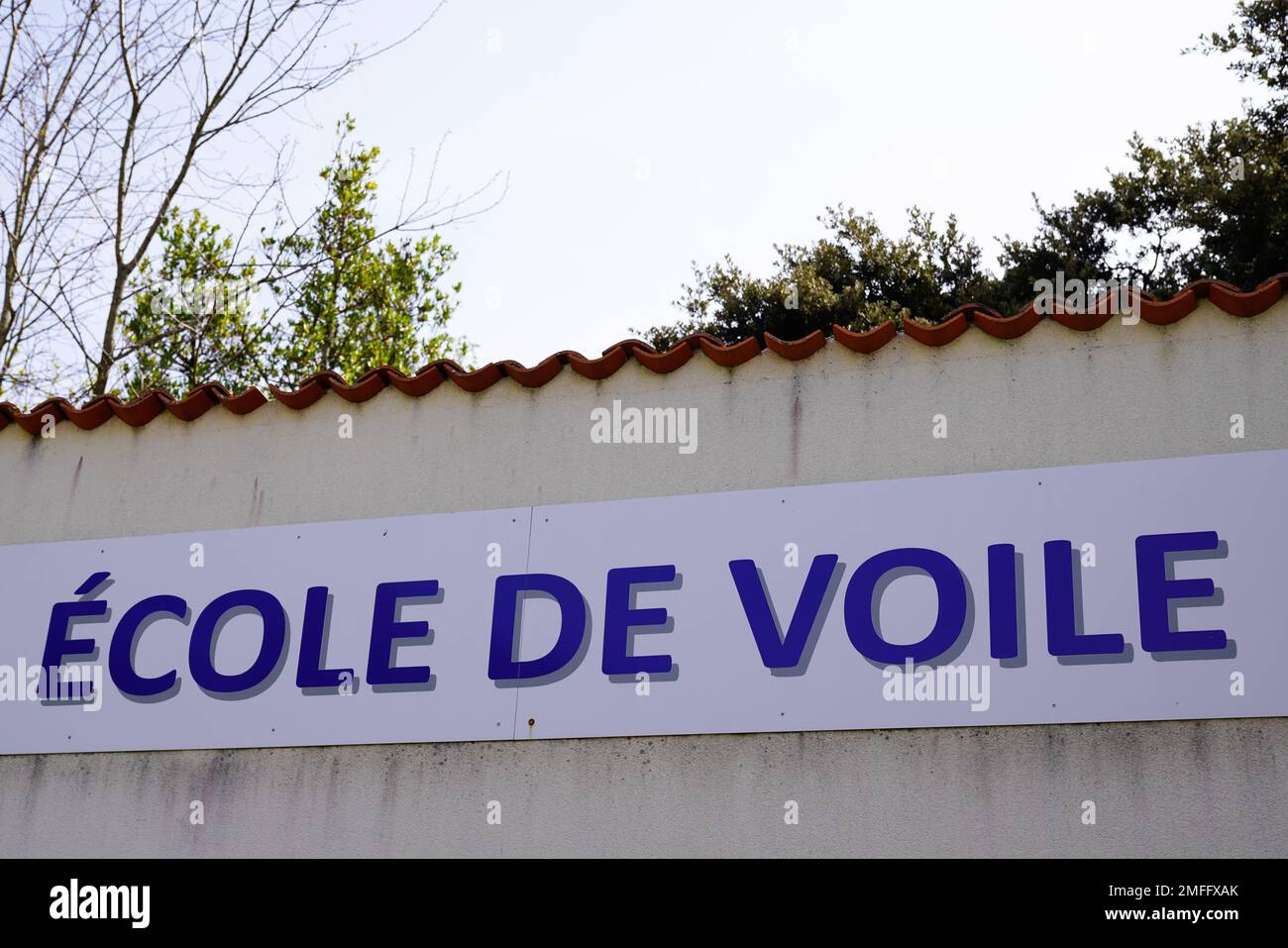 ecole de voile French text means sailing school logo brand and sign ...