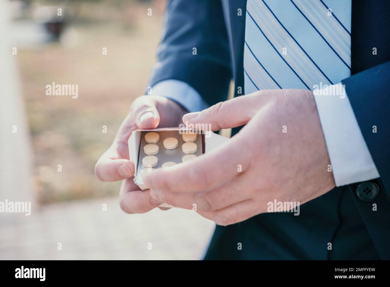 Man takes shows pills vitamins hi-res stock photography and images - Alamy