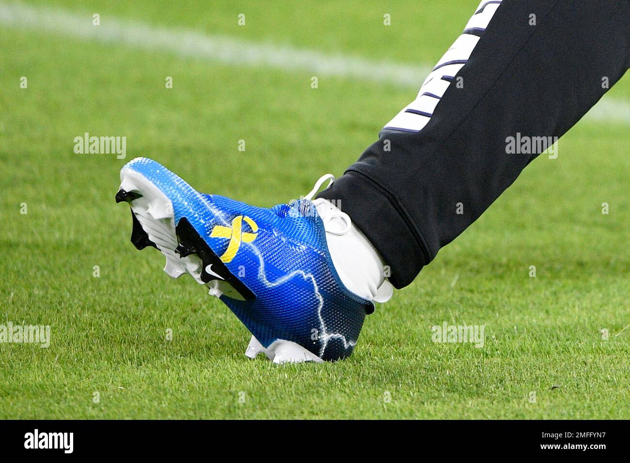 The cleats of Baltimore Ravens quarterback Trace McSorley are seen as ...