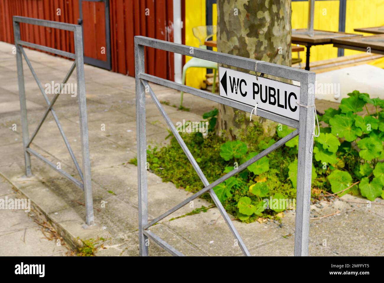 wc public arrow grey fence street text means Toilets public restroom ...