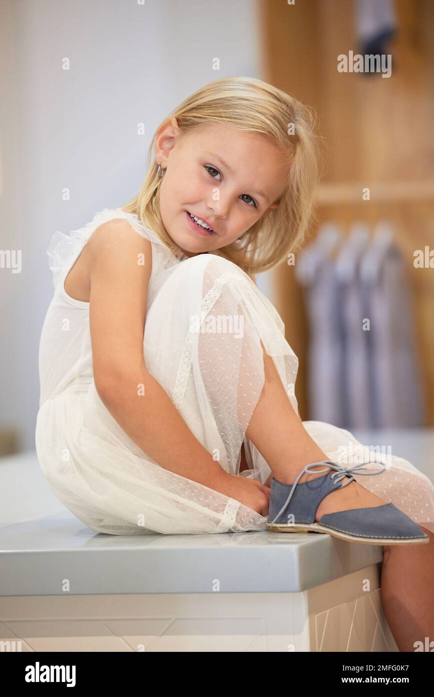 Portrait, children and shoes with a girl customer shopping in a mall or ...