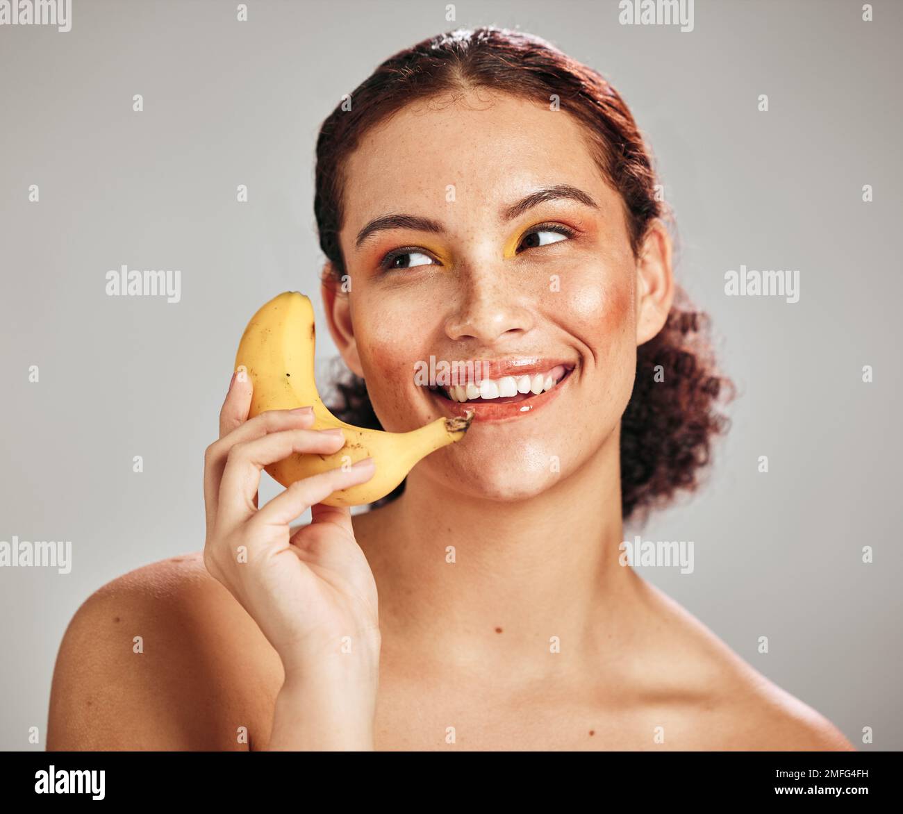 Beauty makeup, face and woman with banana phone for facial skincare ...