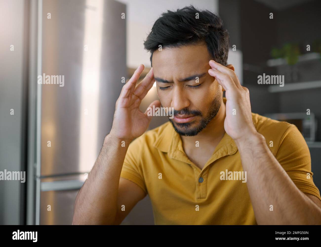 Businessman, home office and stress headache in kitchen for mindset ...