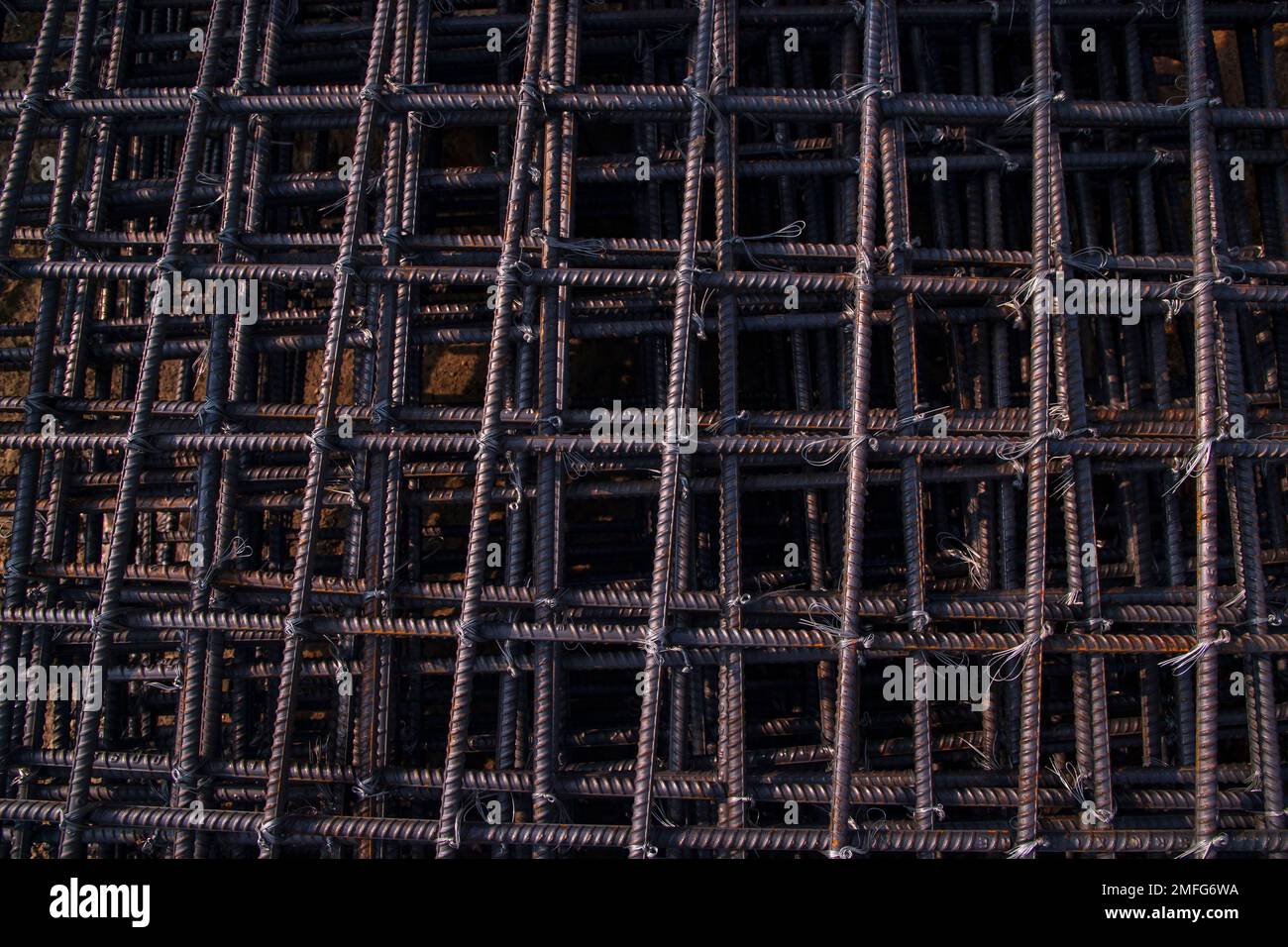 Steel mesh for reinforcement concrete in construction site, closeup of ...