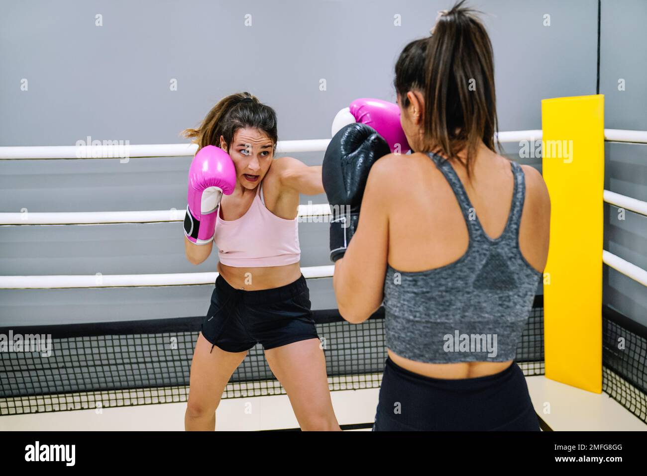 Female boxer throwing a punch hi-res stock photography and images - Alamy