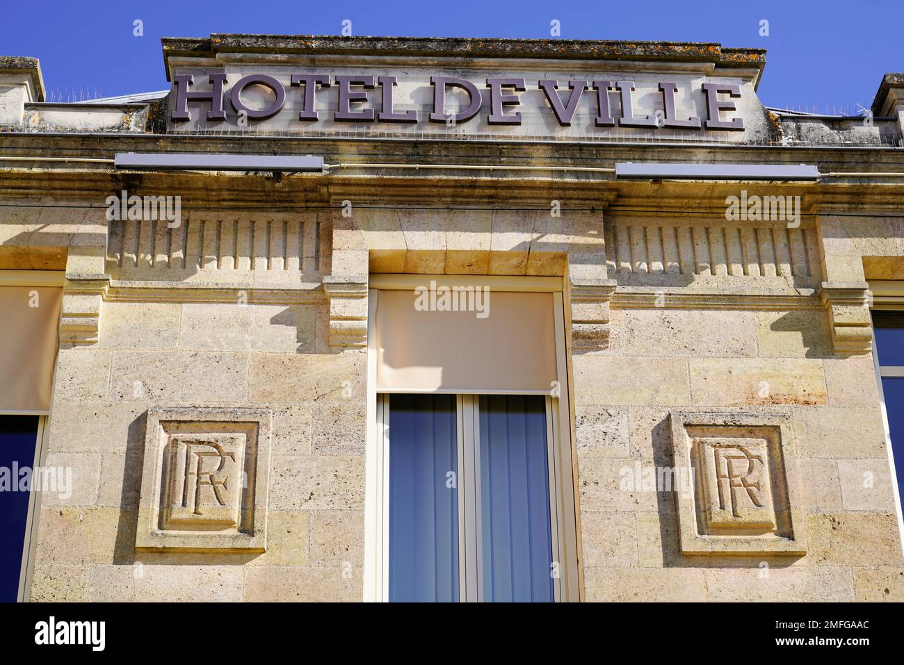 city hall text means hotel de ville in france facade in town center ...