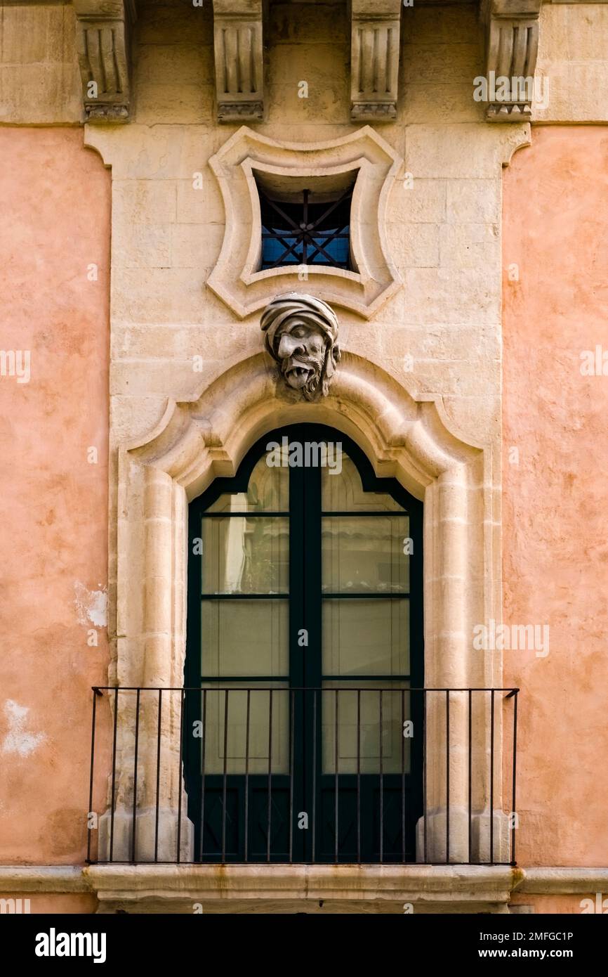 Detail of the artful facade of Palazzo Bertini with balcony, window and ...