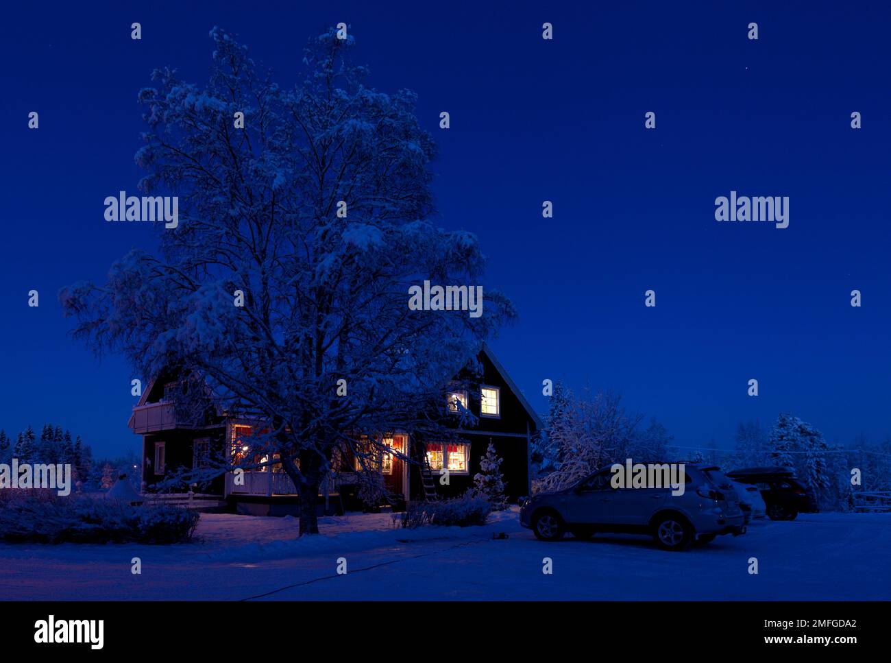 LAPLAND, SWEDEN ON DECEMBER 24, 2014. A wintry farm building in the ...