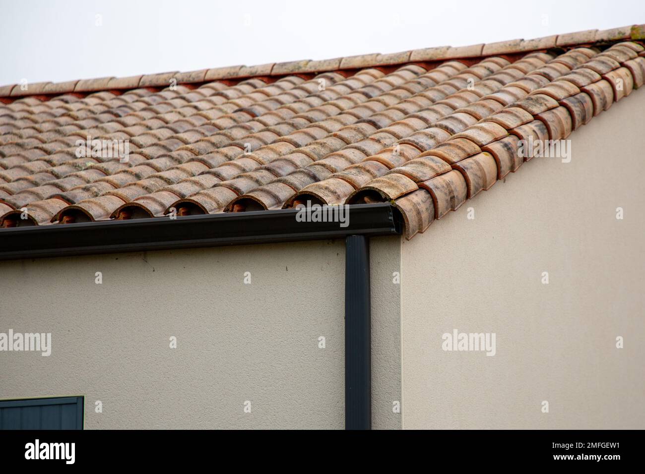 Corner single private new modern house with gutter roof pipe and wall ...