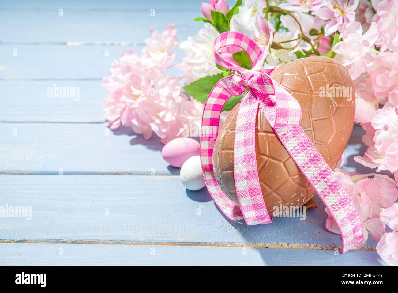 Easter holiday greeting card background, with chocolate eggs, and ...