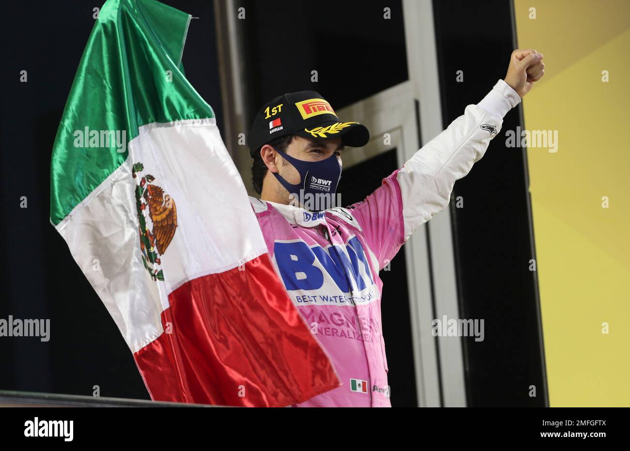 Racing Point driver Sergio Perez of Mexico celebrates after he won the ...