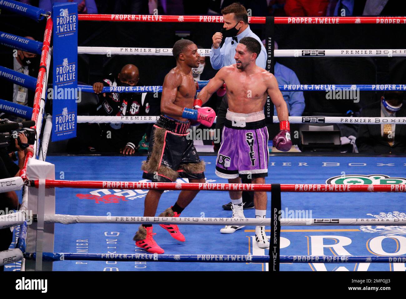 Errol Spence Jr. and Danny Garcia, right, talk after their WBC and IBF ...