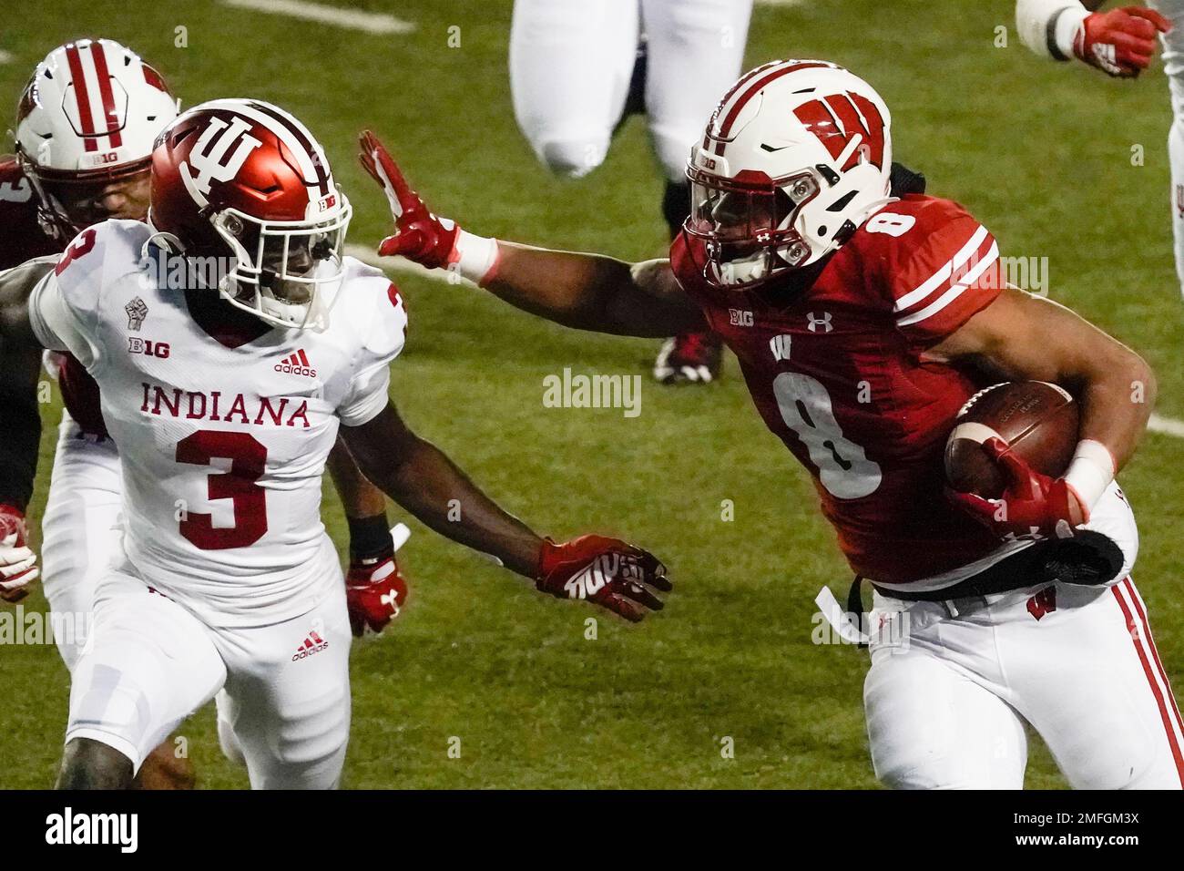 Wisconsin running back Jalen Bergertries to get past Indiana defensive ...