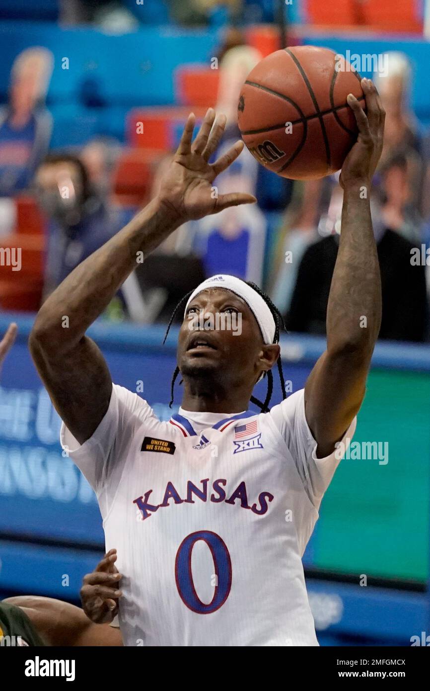 Kansas' Marcus Garrett (0) gets past North Dakota State's Tyree Eady to ...