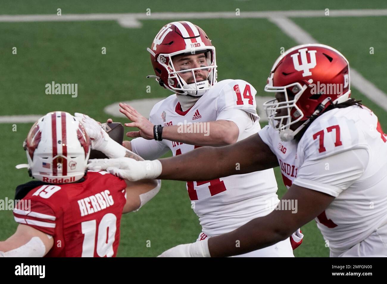 Indiana quarterback Jack Tuttlethrows a pass during the first half of ...