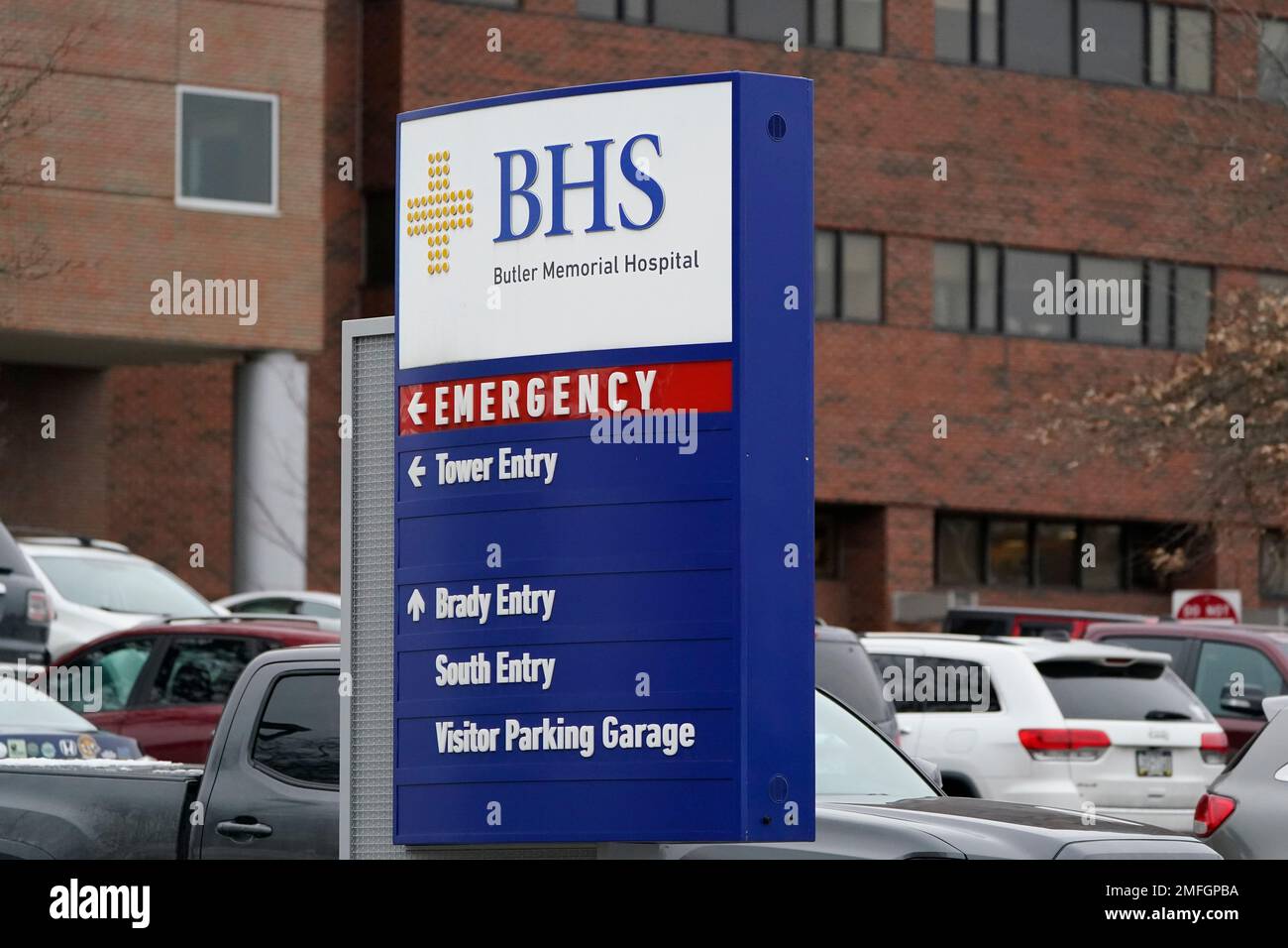 A signs showing an entrance to Butler Memorial Hospital is in front of ...
