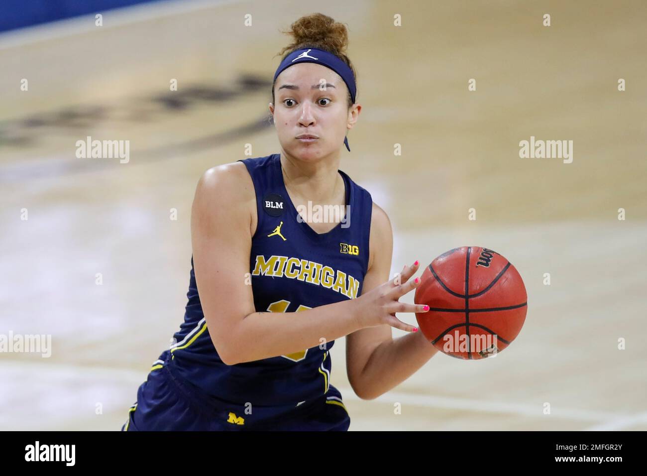 Michigan Wolverines forward Hailey Brown (15) looks to pass the ball ...