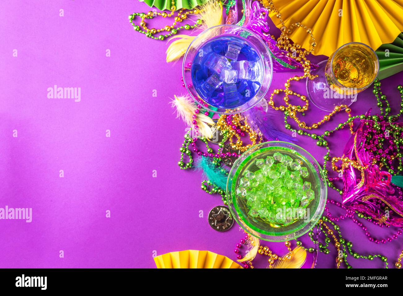 Mardi gras cocktails set. Colorful purple, yellow, green martini ...
