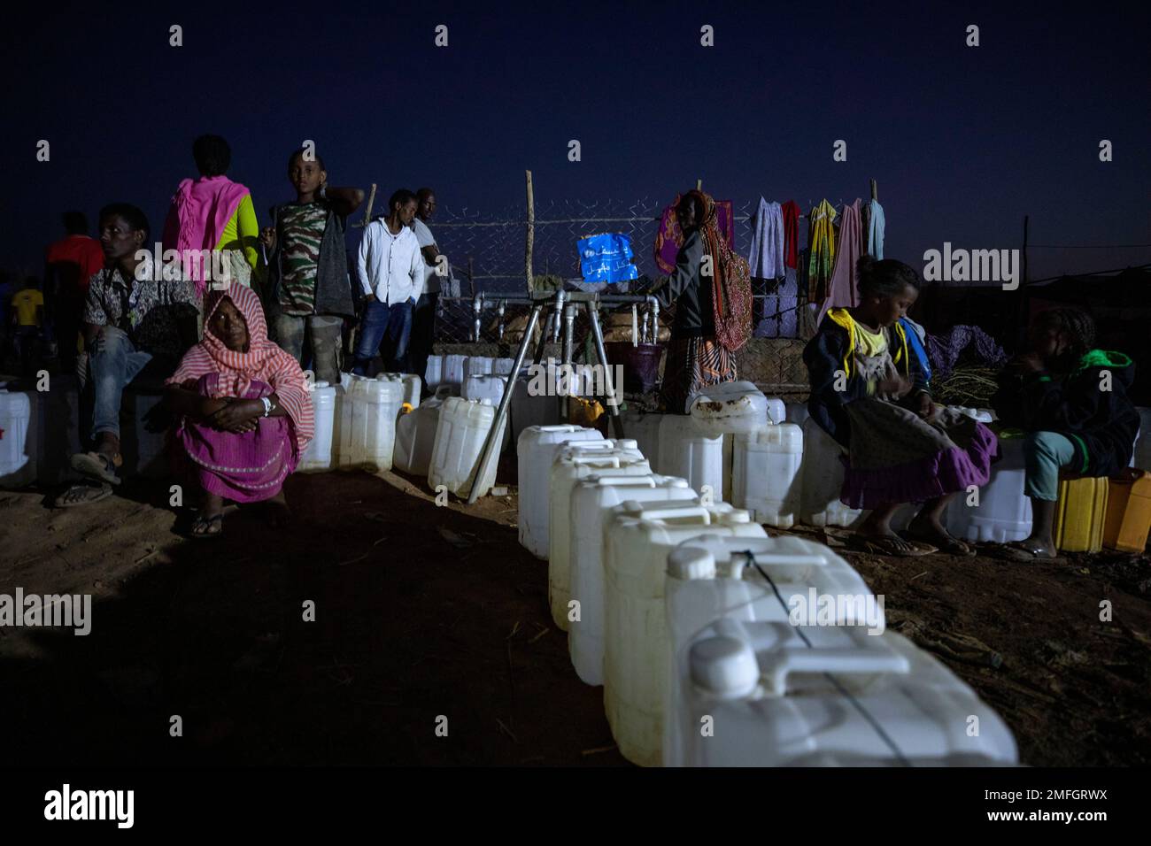 Tigray refugees who fled the conflict in the Ethiopia's Tigray, put ...