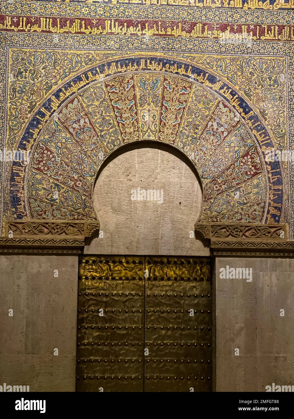 A gate decorated with Arabic calligraphy in Mosque of Cordoba Stock ...