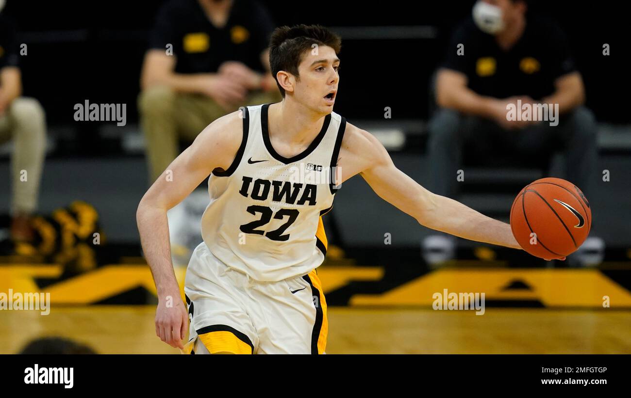 Iowa forward Patrick McCaffery drives up court during an NCAA college ...