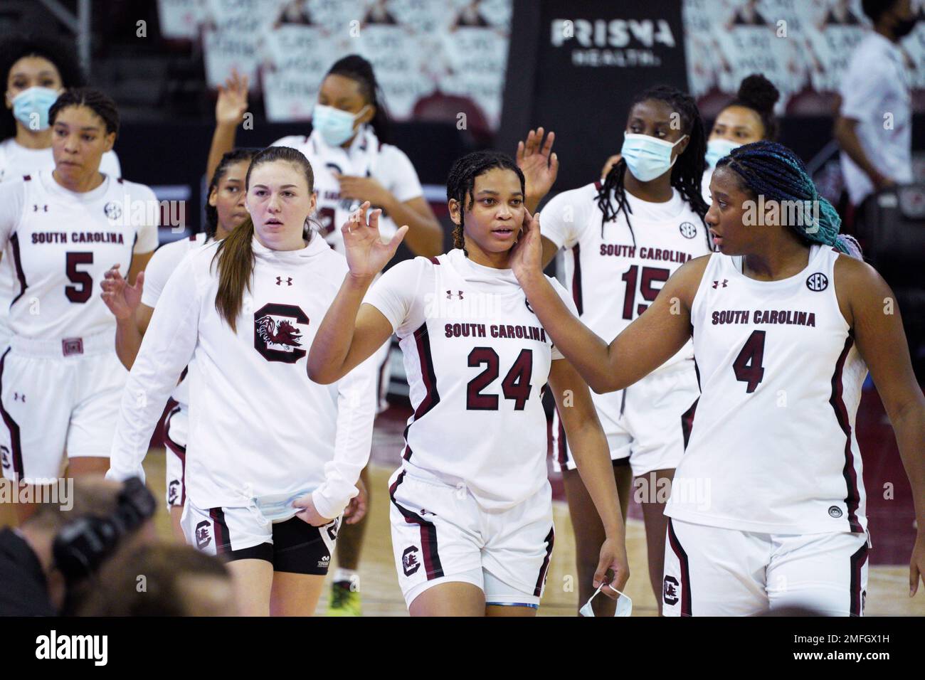 South Carolina's Aliyah Boston (4), LeLe Grissett (24) and teammates ...