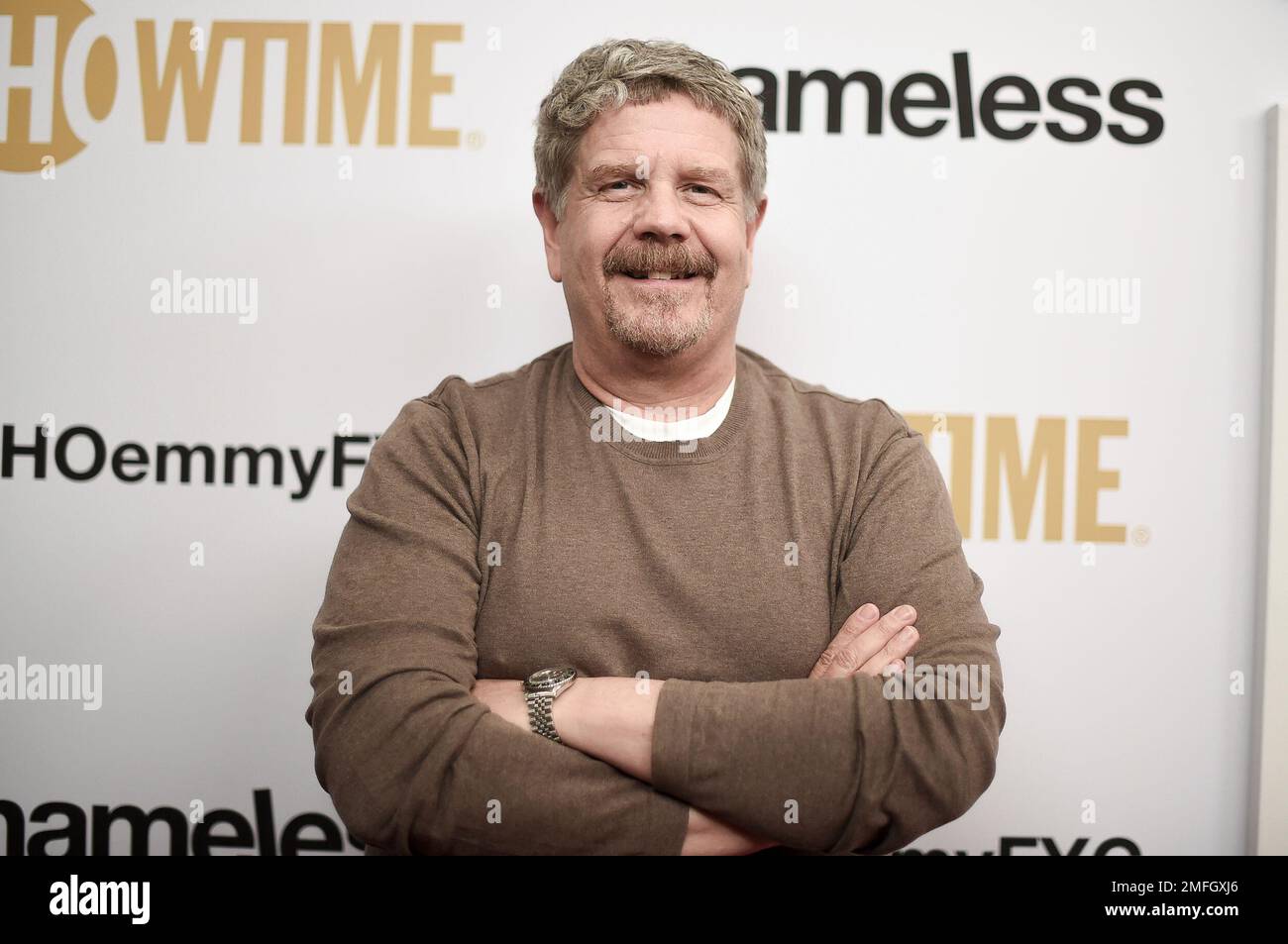 FILE - John Wells attends the "Shameless" FYC event in Los Angeles on ...