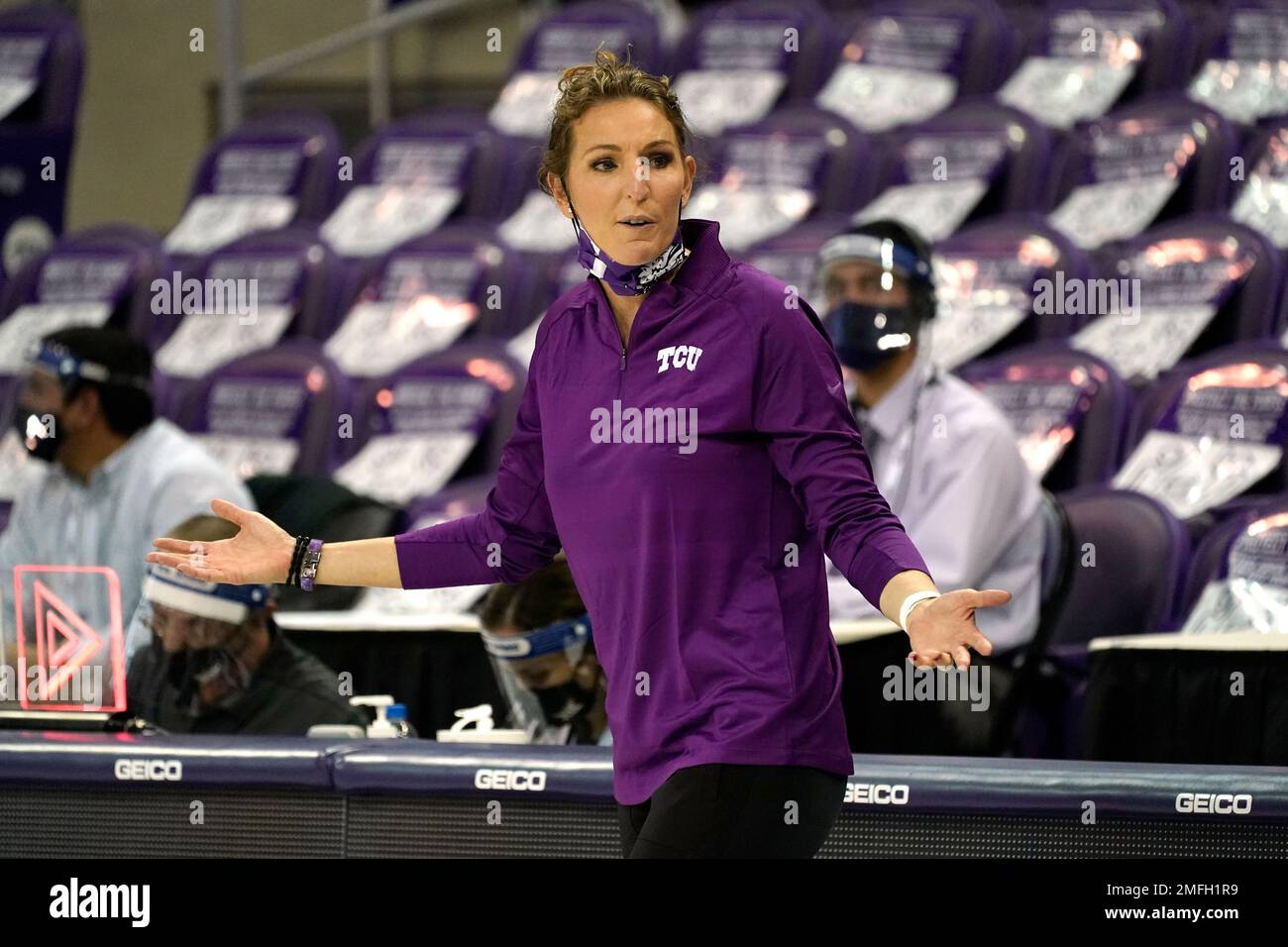 TCU head coach Raegan Pebley talks to an official during an NCAA ...