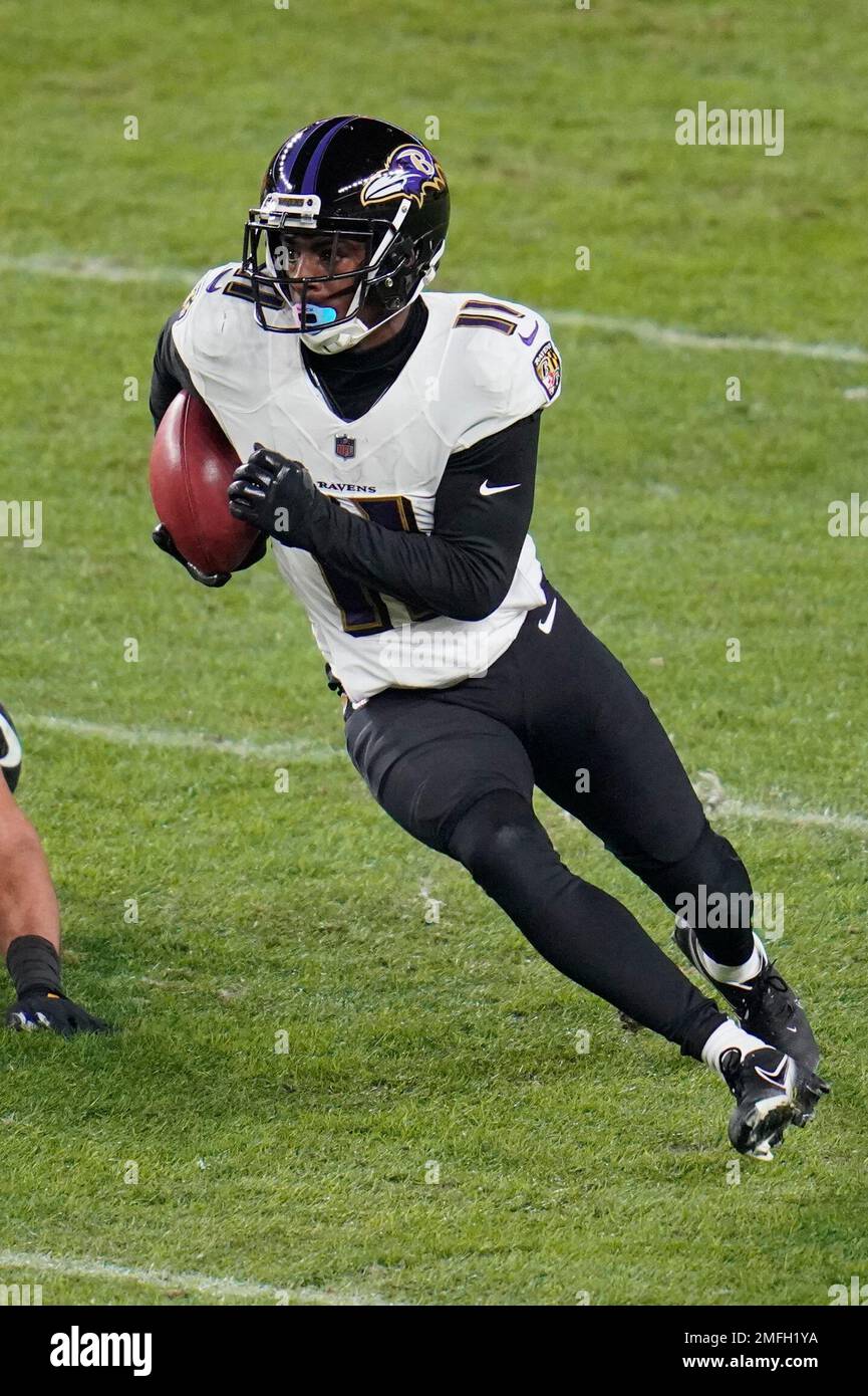 Baltimore Ravens wide receiver James Proche (11) returns a punt during ...
