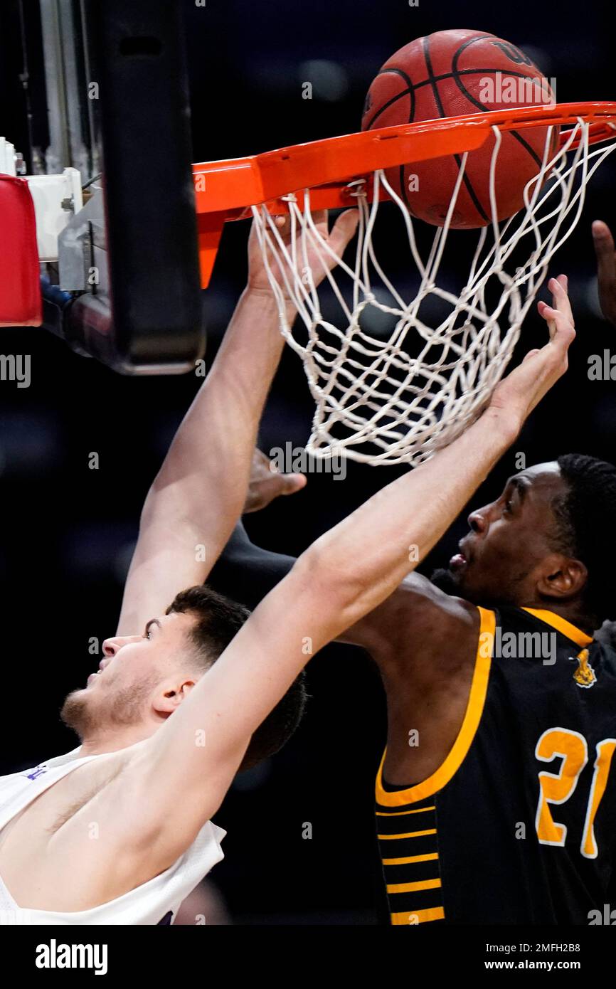 Northwestern forward Robbie Beran, left, dunks against Arkansas-Pine ...