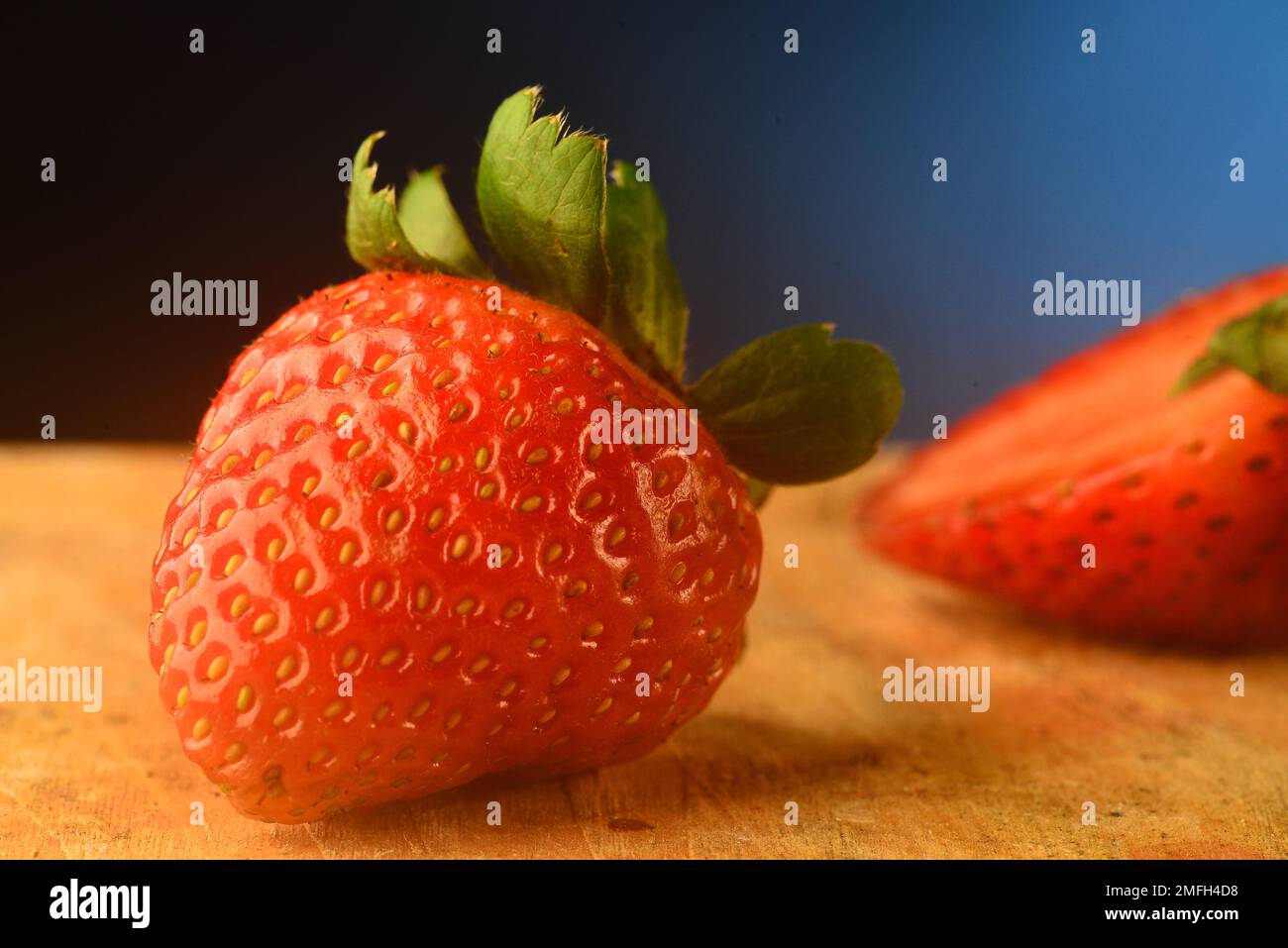 Strawberry close up on studio shot Stock Photo - Alamy