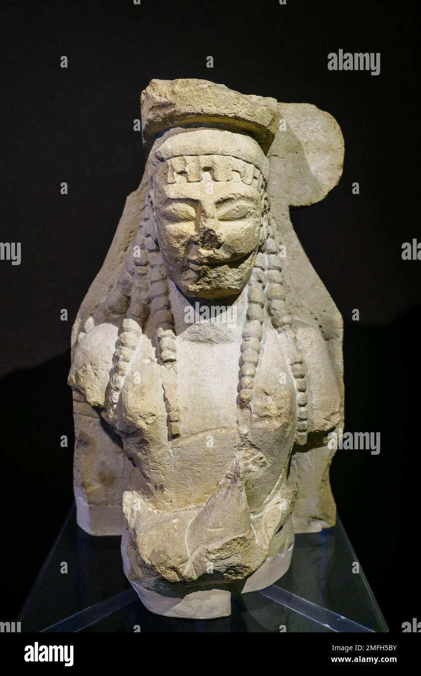 High relief of a Kore, probably on a throne, with dove in her hand ...